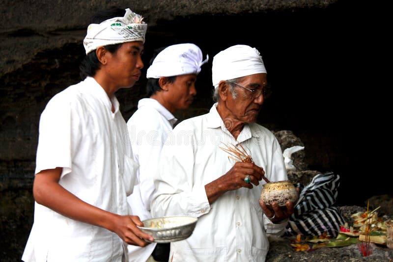 A Priest and His Assistant in Bali, Indonesia Editorial Photo - Image ...