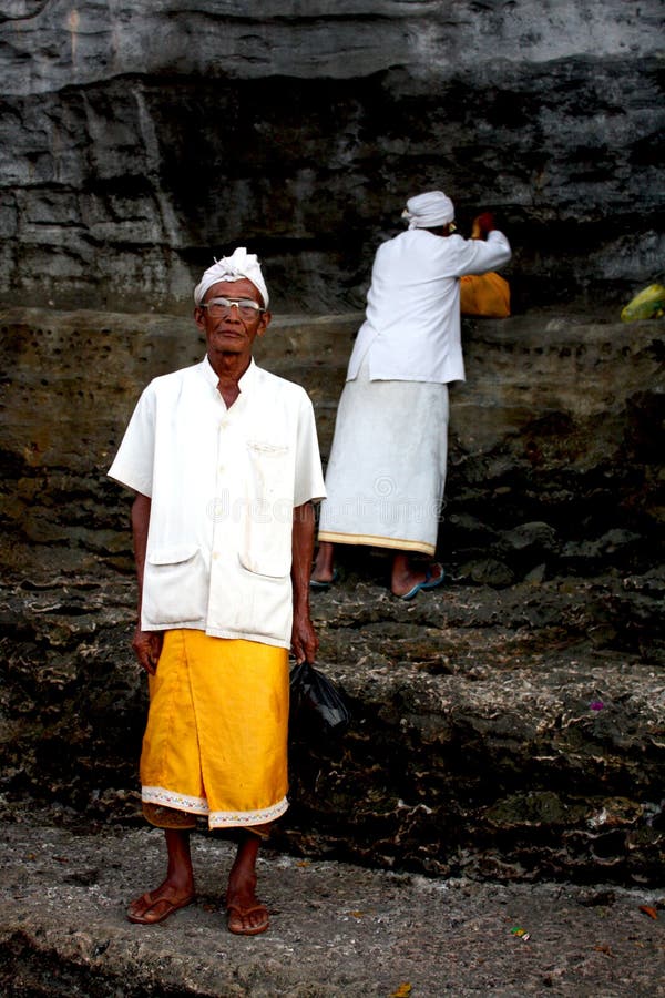 A Priest and His Assistant in Bali, Indonesia Editorial Stock Image ...