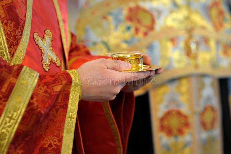 Priest Holding Bread and Wine Stock Image - Image of priest, ceremony ...