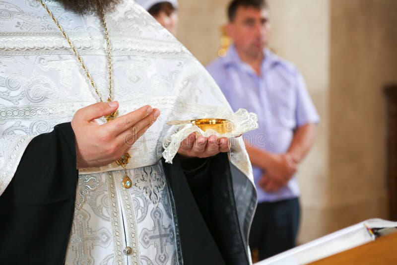 Priest Holding Bread And Wine Stock Image - Image of priest, ceremony ...