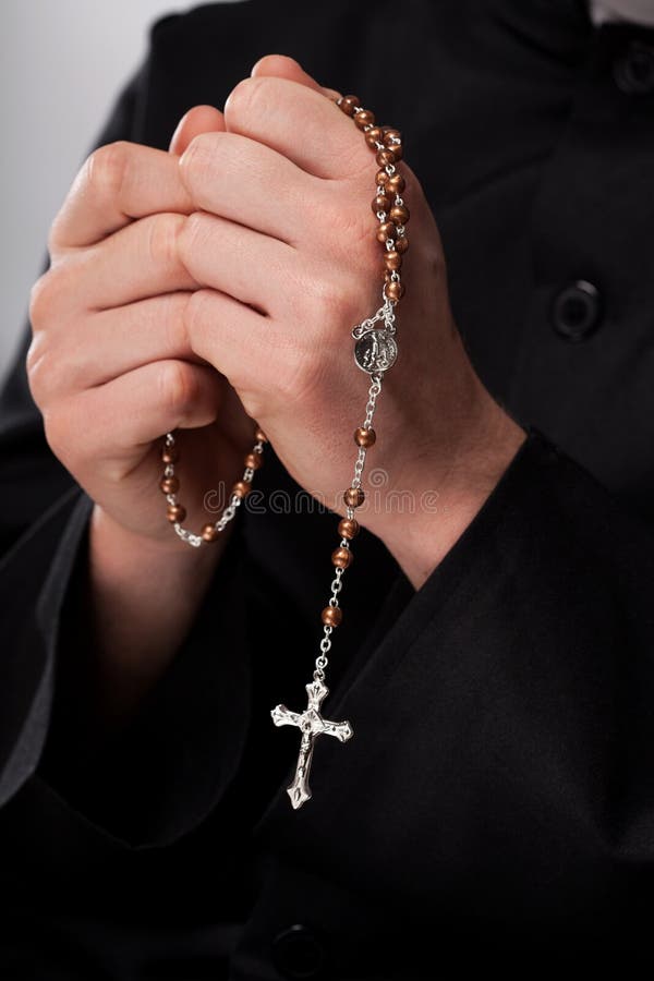 Priest with rosary stock image. Image of spiritual, belief - 39858947