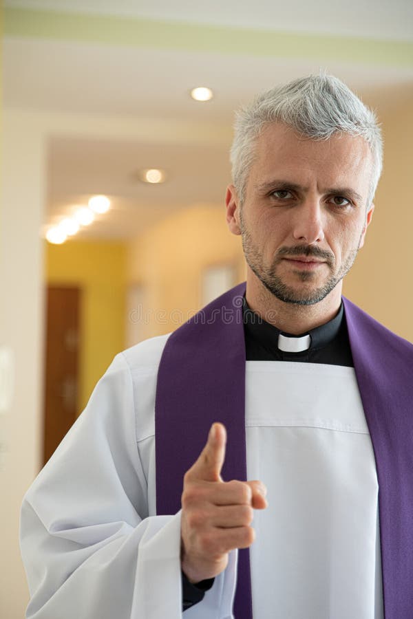 Catholic Priest Confessives in the Confessional. Confession of Sins ...