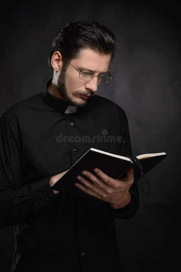 Priest with Holy Bible. Portrait of Priest Reading the Holy Bible Stock ...
