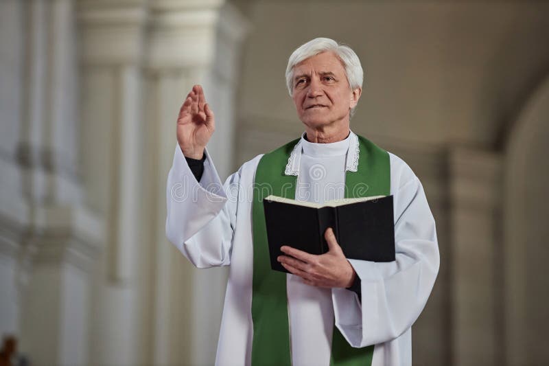 Priest Reading Prayers during Religious Ceremony Stock Photo - Image of ...