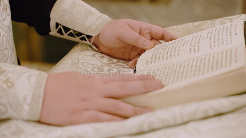 A Priest Reads a Prayer Book Stock Footage - Video of open, catholic ...