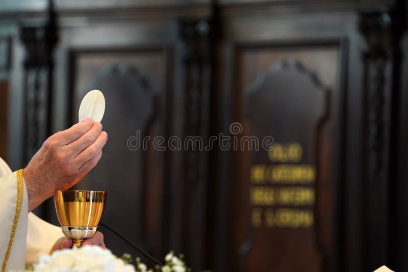 Priest Showing the Host during the Mass Stock Photo - Image of altar ...