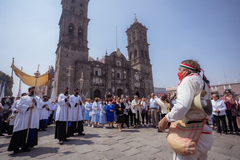 Priests and Members of the Catholic Church Perform a Procession ...