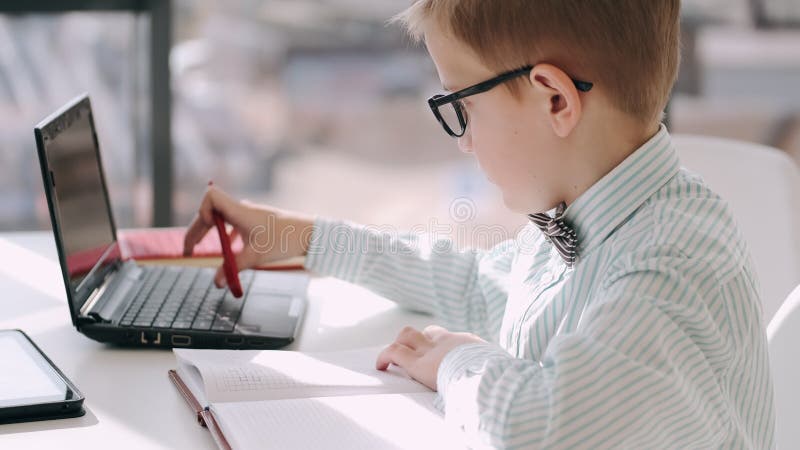 Primary School Student is Learning with a Laptop Stock Video - Video of ...