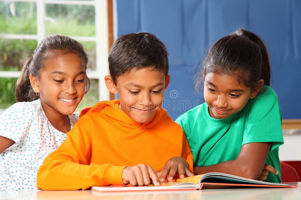 Primary School Children in Class Reading Learning Stock Photo - Image ...
