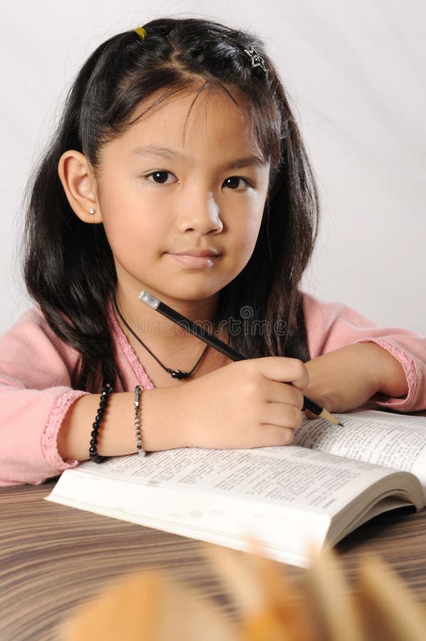 Primary school girl stock image. Image of student, dictionary - 6970147
