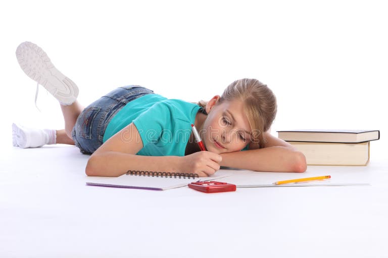 Primary School Girl Doing Math Homework on Floor Stock Photo - Image of ...