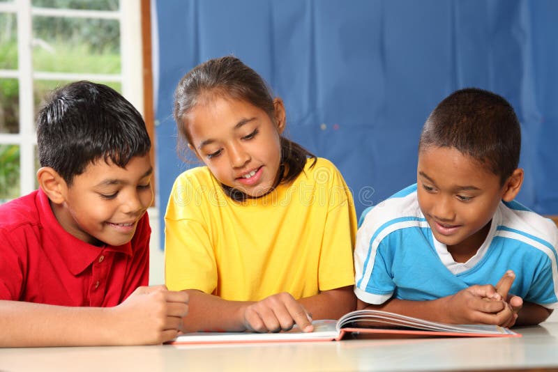 Primary School Kids Learning Together in Classroom Stock Image - Image ...