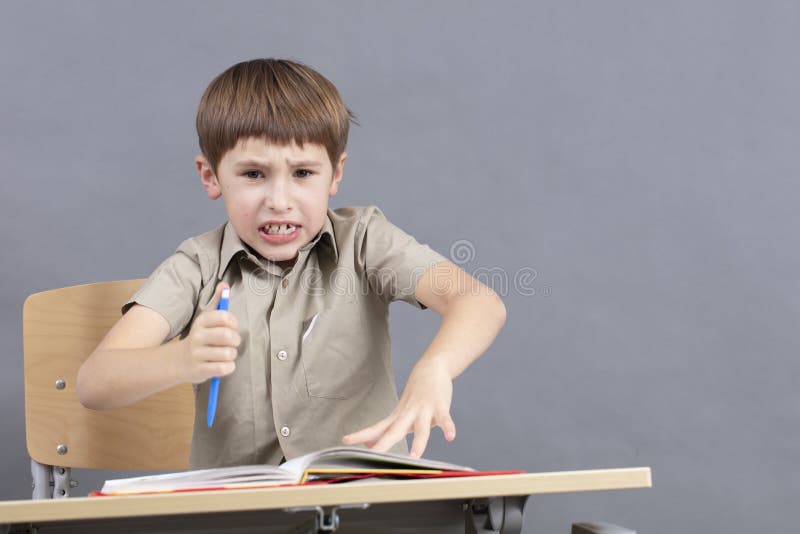A Primary School Student is Doing Homework. Stock Photo - Image of ...