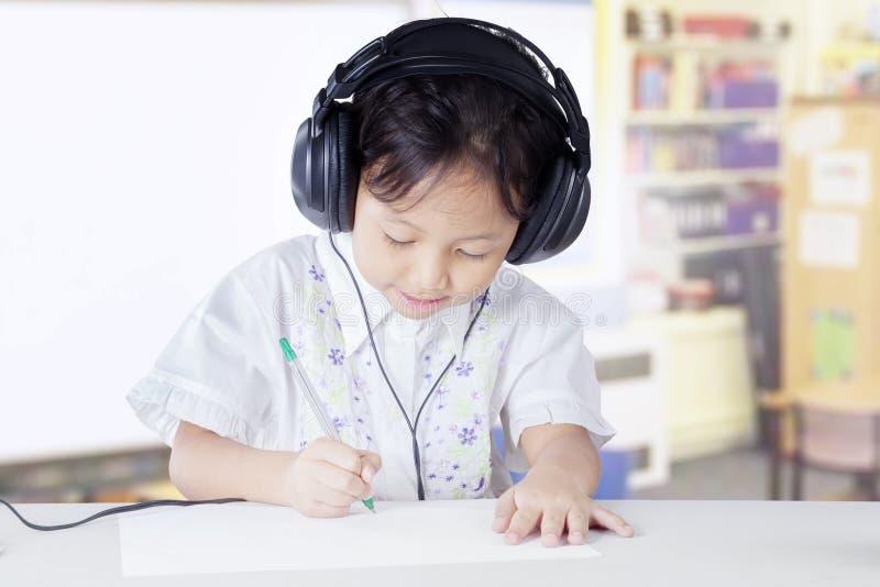 Primary School Student Studying in Class with Headset Stock Image ...
