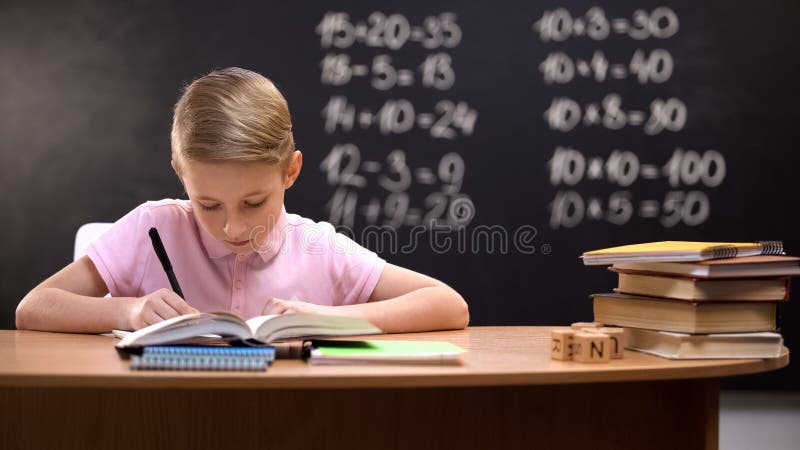 Primary Schoolboy Writing Exercises in Notebook, Preparing Homework ...