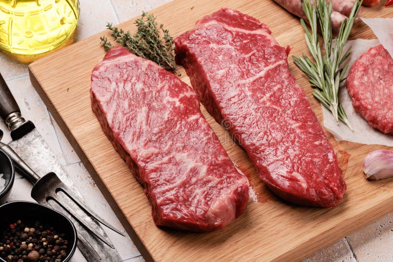 Prime Marbled Beef Steaks. Raw Striploin Steak Stock Photo - Image of ...