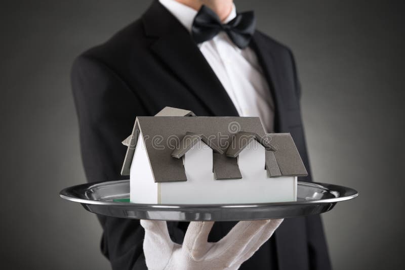 Primer De Butler with House Model Imagen de archivo - Imagen de capa ...