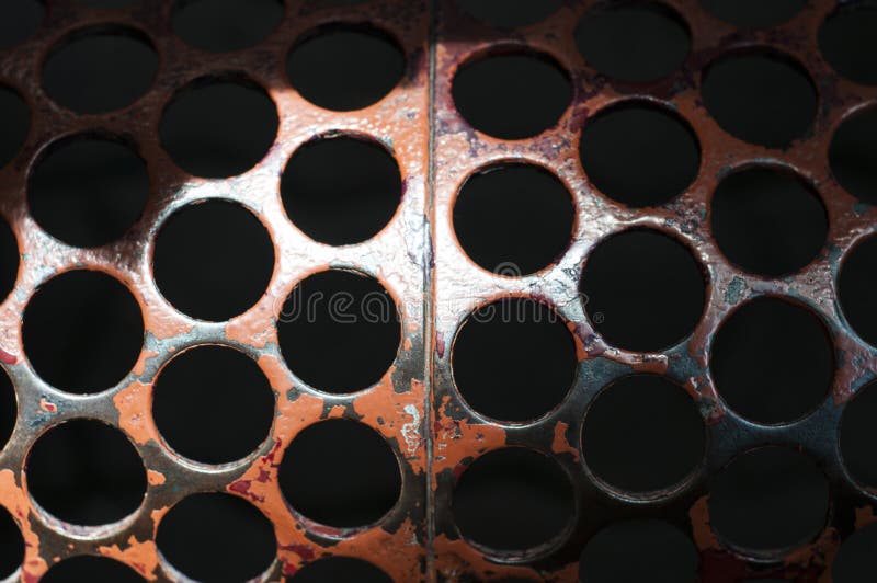 Metal agujereado. imagen de archivo. Imagen de shapes - 32354235
