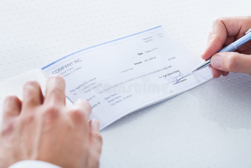 Primer Del Cheque De Relleno De La Mano Imagen de archivo - Imagen de ...
