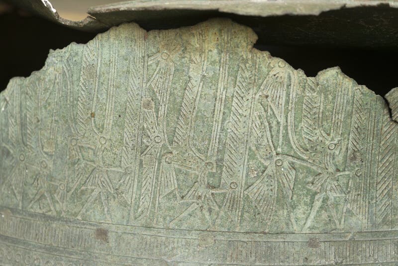 Primitive Art Craving on Surface of Ancient Bronze Drum. Stock Image ...