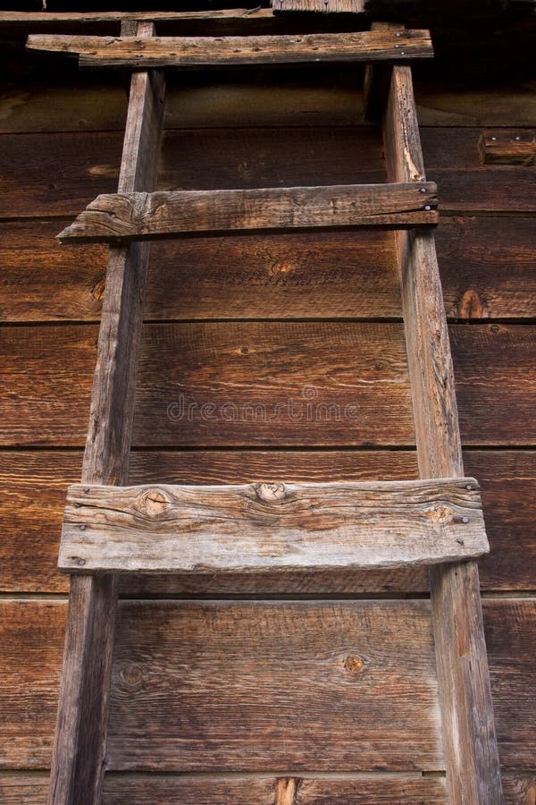 Primitive Wooden Ladder in Old Barn Stock Photo - Image of wall, barn ...