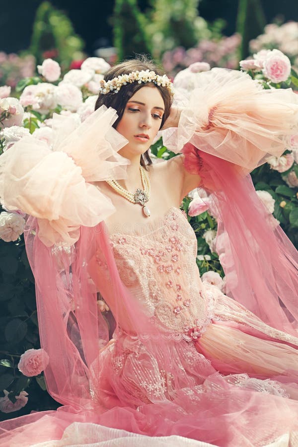 Princess in a Magic Rose Garden Stock Photo - Image of flowers ...
