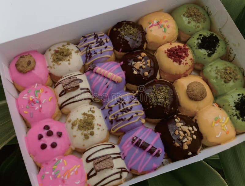 Beautiful and Delicious Multi-colored Donuts Stock Photo - Image of ...