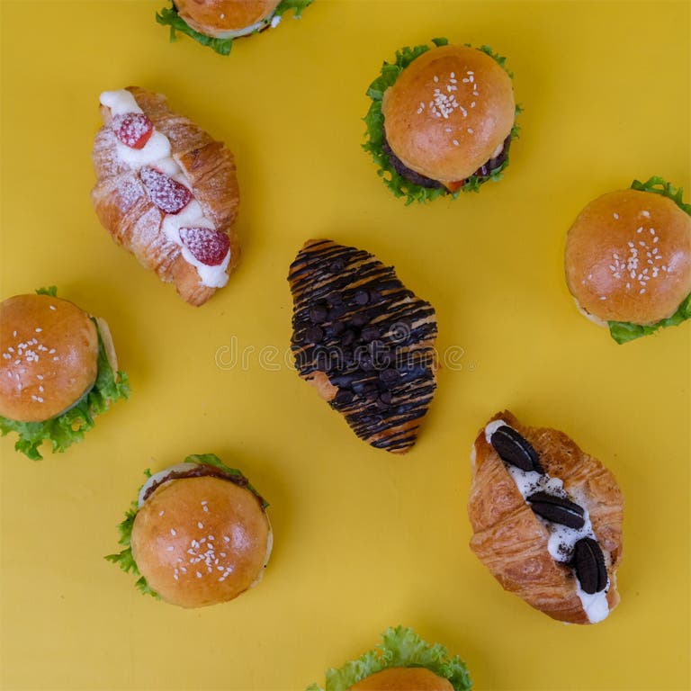 Top View of Assorted Mini Croissant and Burger Isolated on Yellow ...