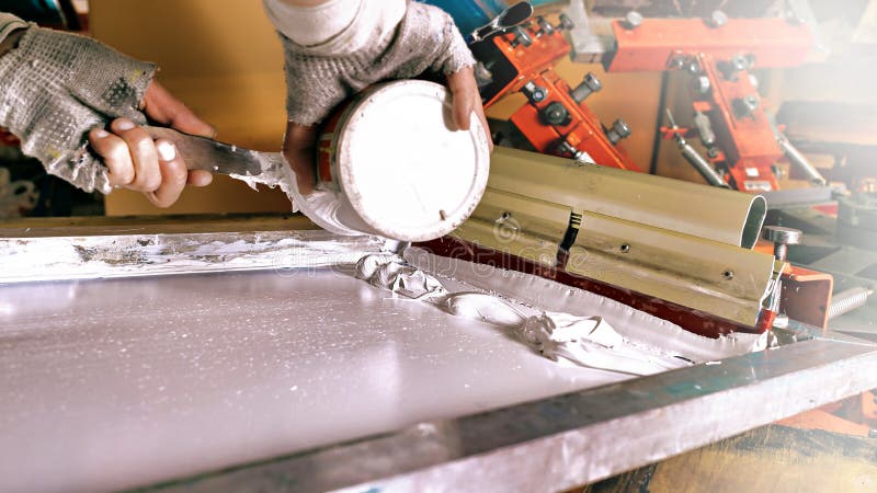 Print Screening Apparatus, Can of White Paint and Hands of a Worker ...