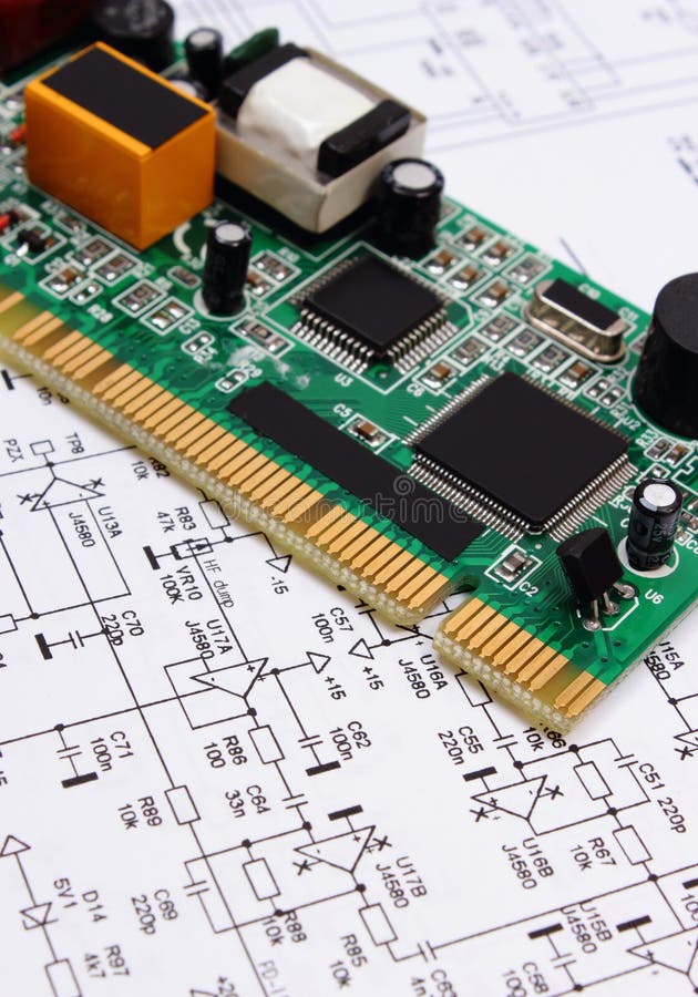 Printed Circuit Board Lying on Diagram of Electronics, Technology Stock ...