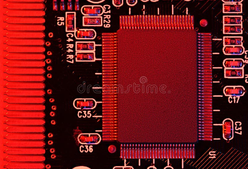 Printed Circuit Board and Microchip, or Cpu, in Red Light Closeup ...