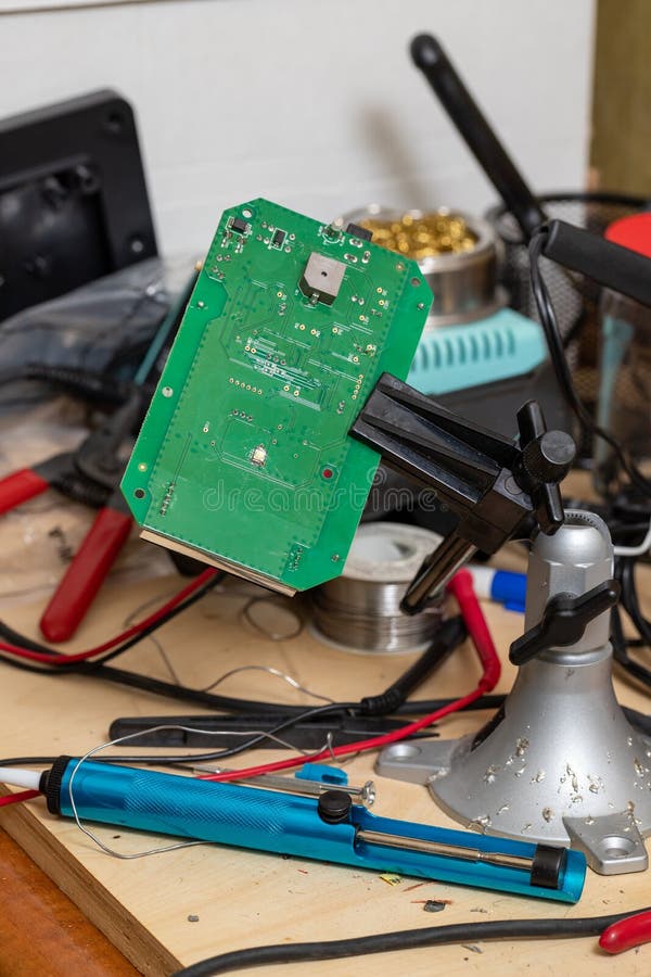 Printed Circuit Board in Vice on Workbench Stock Photo - Image of ...
