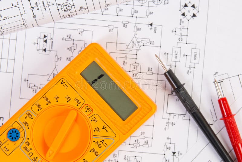 Printed Drawings of Electrical Circuits and Digital Multimeter. Science ...