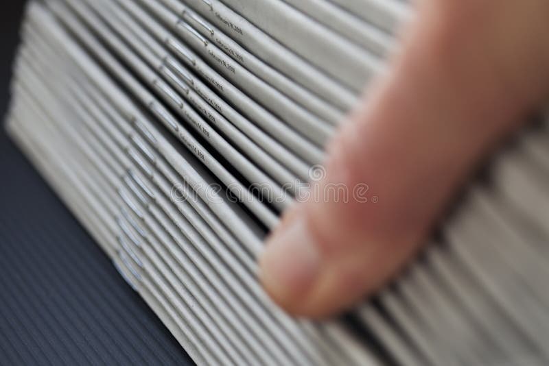 Printed Newspapers Thumbed through by Reader Stock Photo - Image of ...