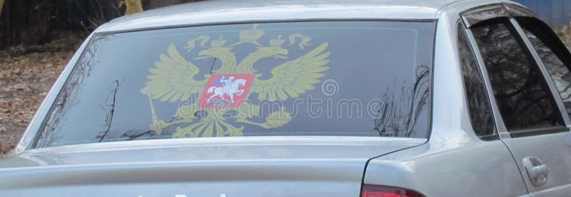 Printed Two-headed Eagle on the Rear Glass of a Car Stock Photo - Image ...