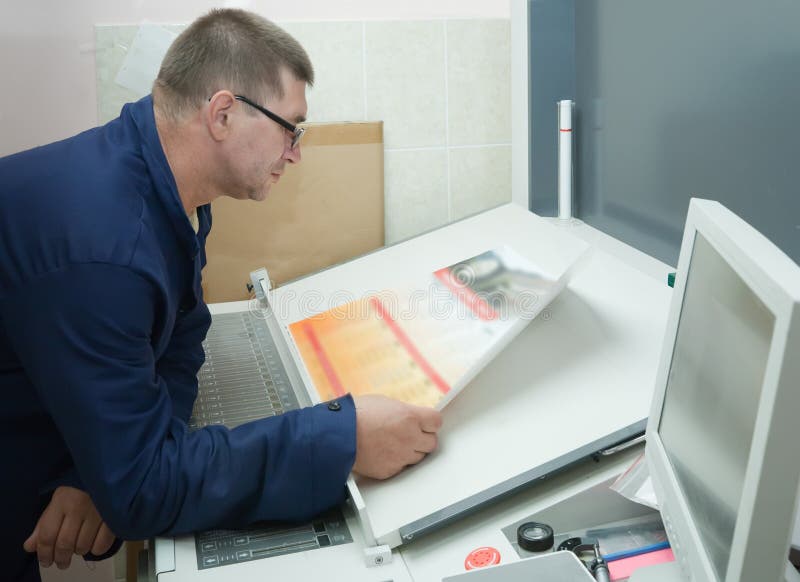 Printer Checking a Print Run Stock Image - Image of worker, magazine ...