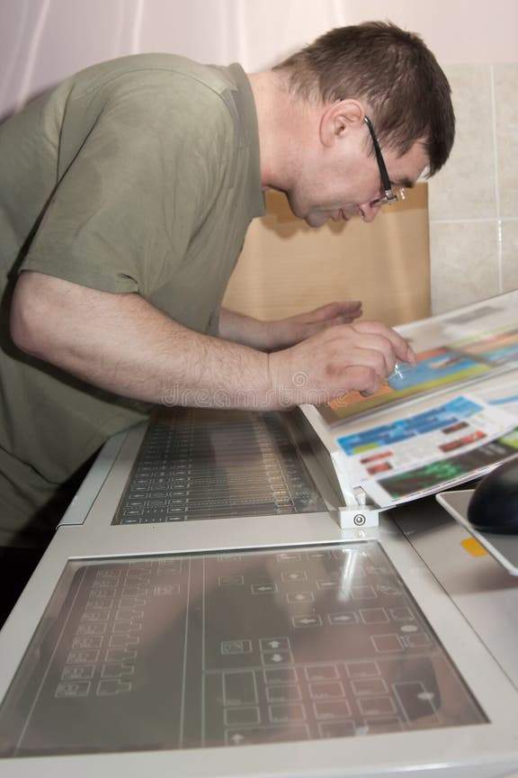 Printer Checking a Print Run Stock Image - Image of tool, industry: 9084191