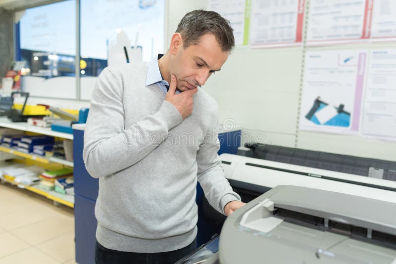 Printer Checking Print Run at Table Stock Image - Image of polygraph ...