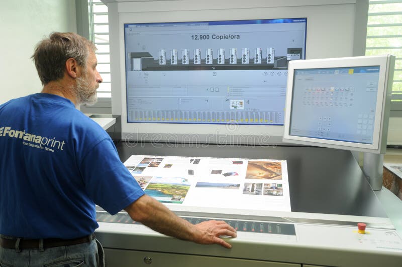 Printer Checking a Print Run at Table Editorial Photography - Image of ...