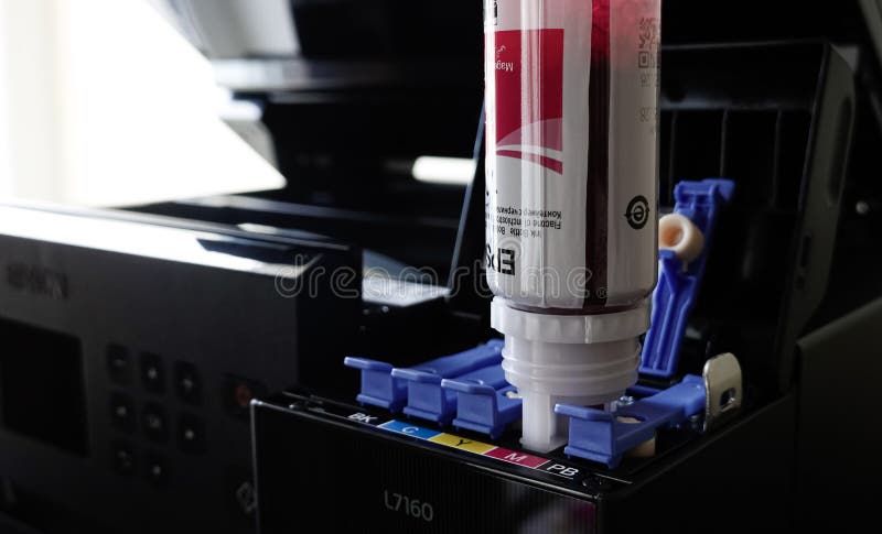 Printer with CISS System. Setting Up an Epson L7160 Printer Editorial ...