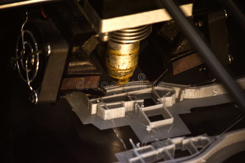 Printer Printing Gray Objects on Mirror Reflective Surface Close-up Top ...