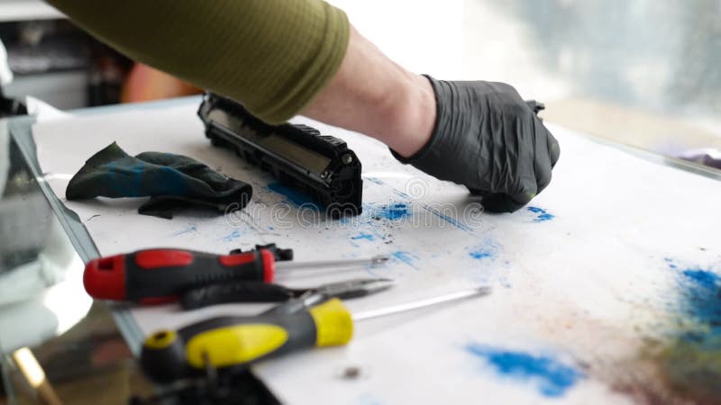 Computer Technician Engineer is Refilling a Laser Toner Cartridge ...