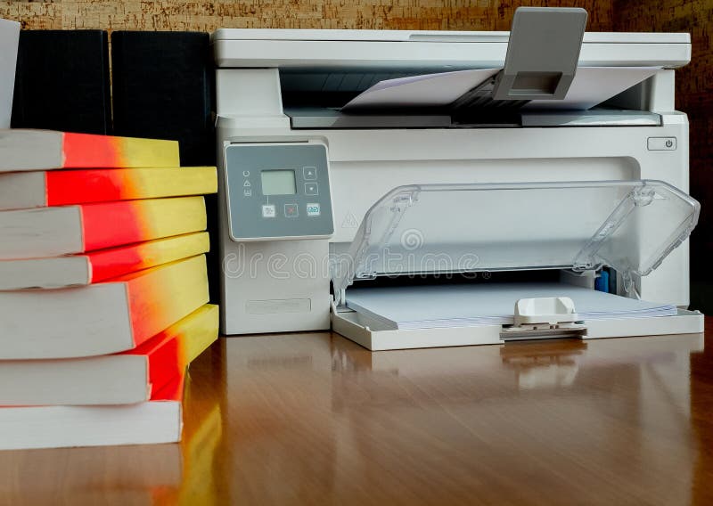 Printer and Stack of Books on His Desk. Office Concept Stock Image ...