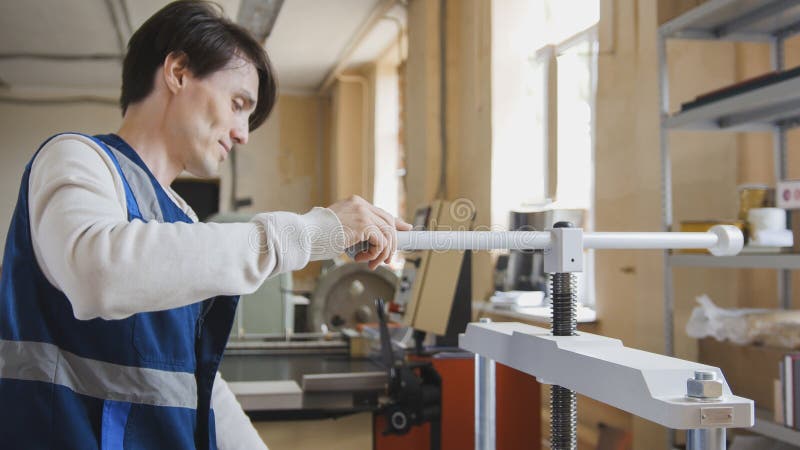 The Printer Works with the Printing Press Stock Image - Image of ...