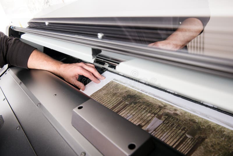Printing Out Graphic Photo on Wide Printer Stock Image - Image of ...