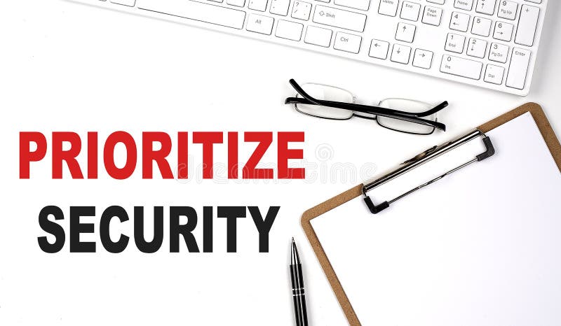 Prioritize Security Text Written on the White Background with Keyboard ...