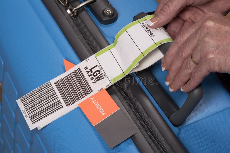 Priority Airline Security Tag on Suitcase Editorial Stock Photo - Image ...