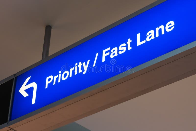 Departure and Priority Lane Board Sign at International Airport Stock ...