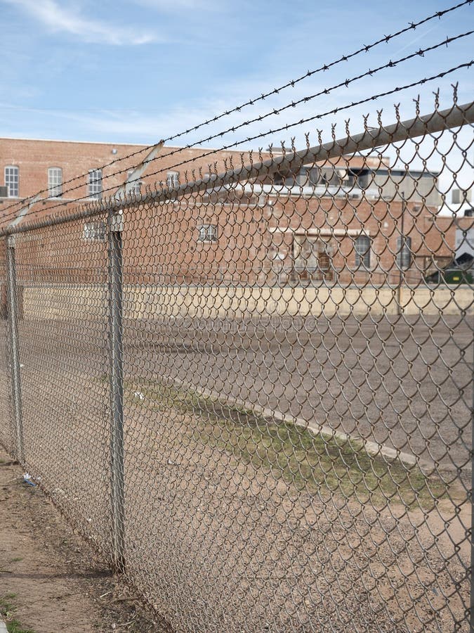 Prison Barb Wire Wall and Prison Building Stock Image - Image of ...