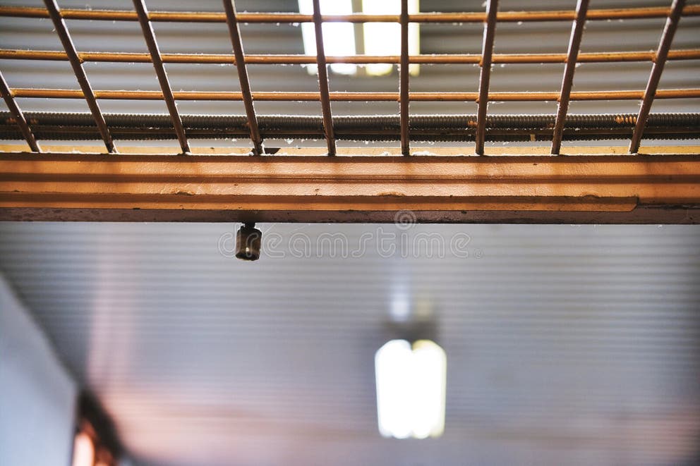 Prison Ceiling with Metal Bars and Industrial Lighting Stock Photo ...